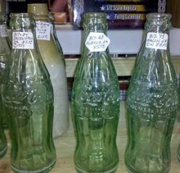 Spotting a fake Coca Cola bottle – Auction Finds